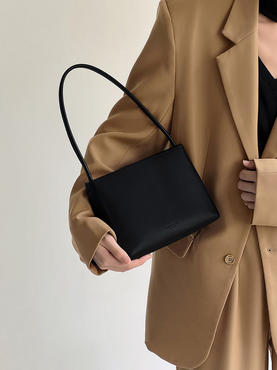 High-end walnut bag niche baguette underarm bag women's bag 2024 spring ...